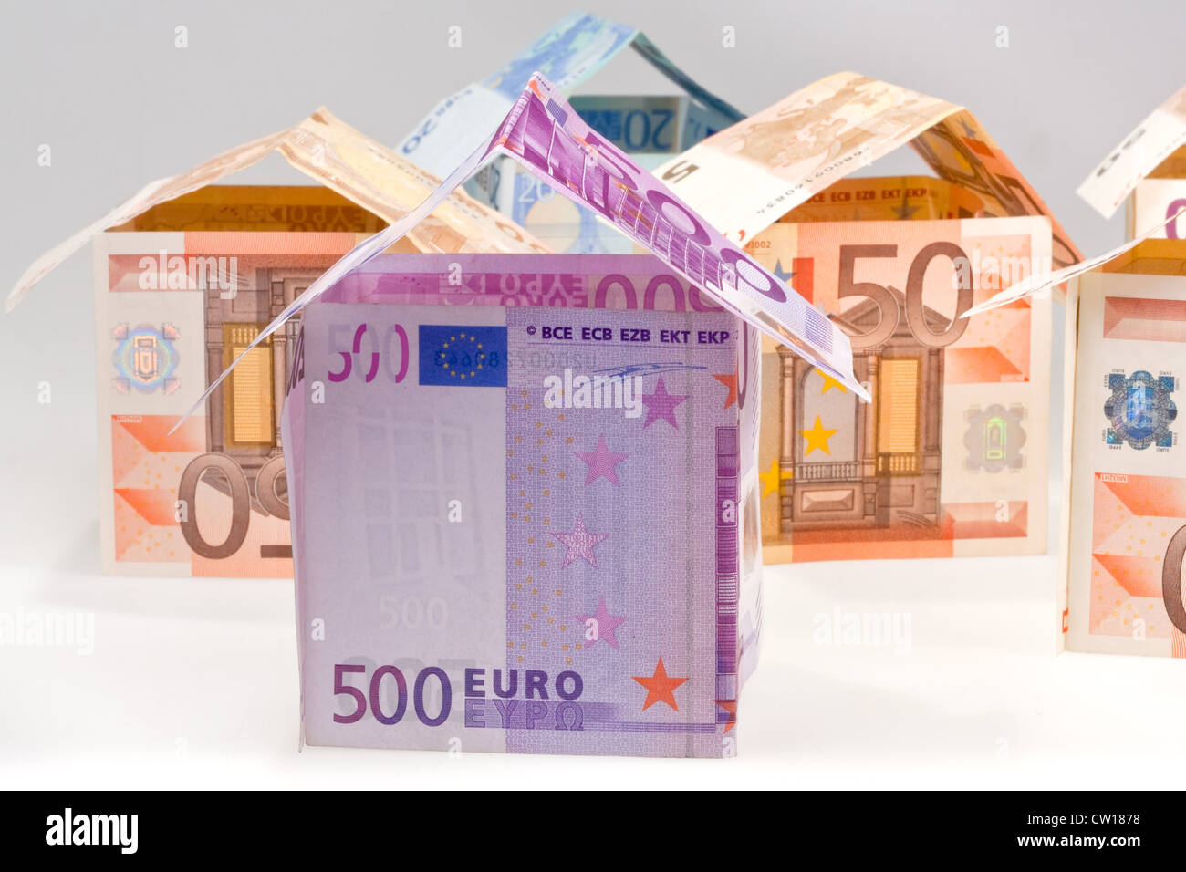 expensive houses from euro banknotes Stock Photo - Alamy