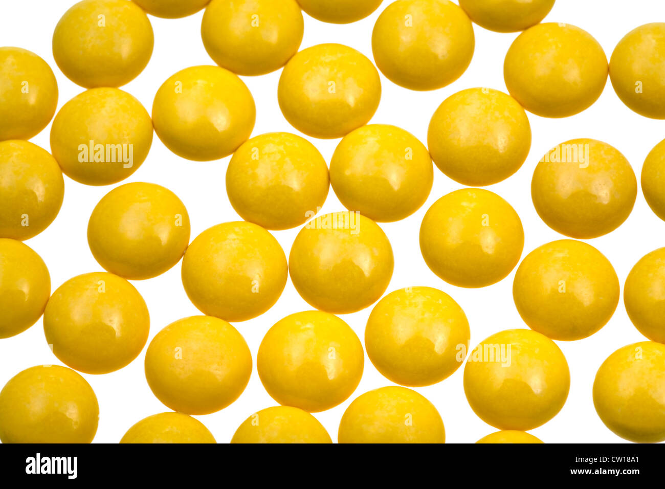 many yellow vitamin drug close up Stock Photo - Alamy