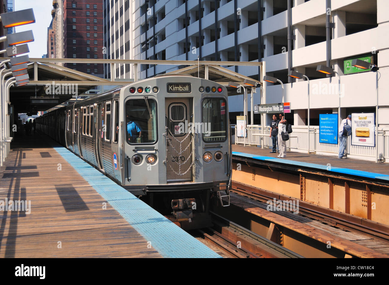 USA Illinois Chicago A Brown Line elevated train pulling into the ...