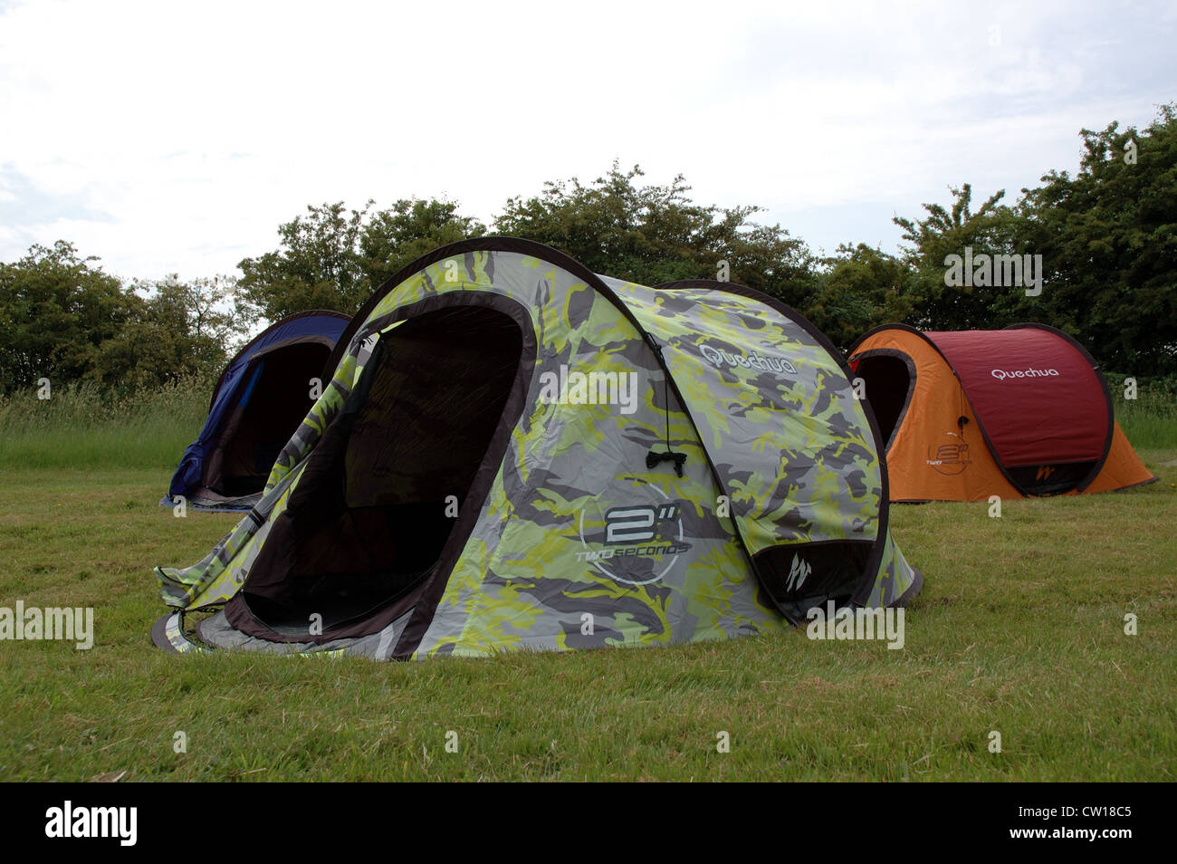 Group of instant pitching pop-up tents, ideal for beginner camping and ...