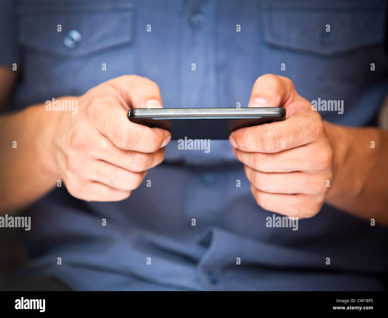 Close up of a man using mobile smart phone Stock Photo - Alamy