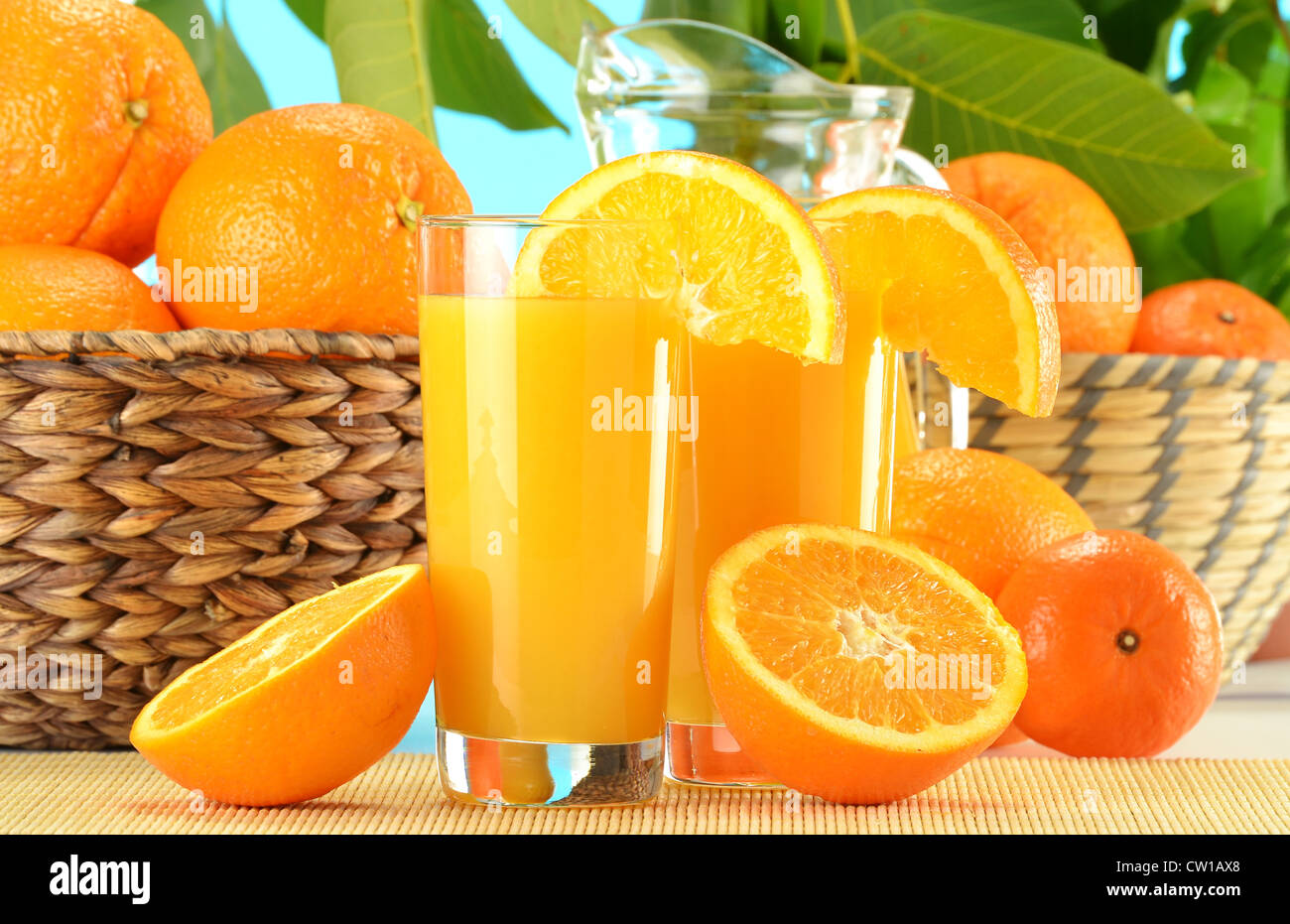 Composition with two glasses of orange juice and fruits Stock Photo - Alamy