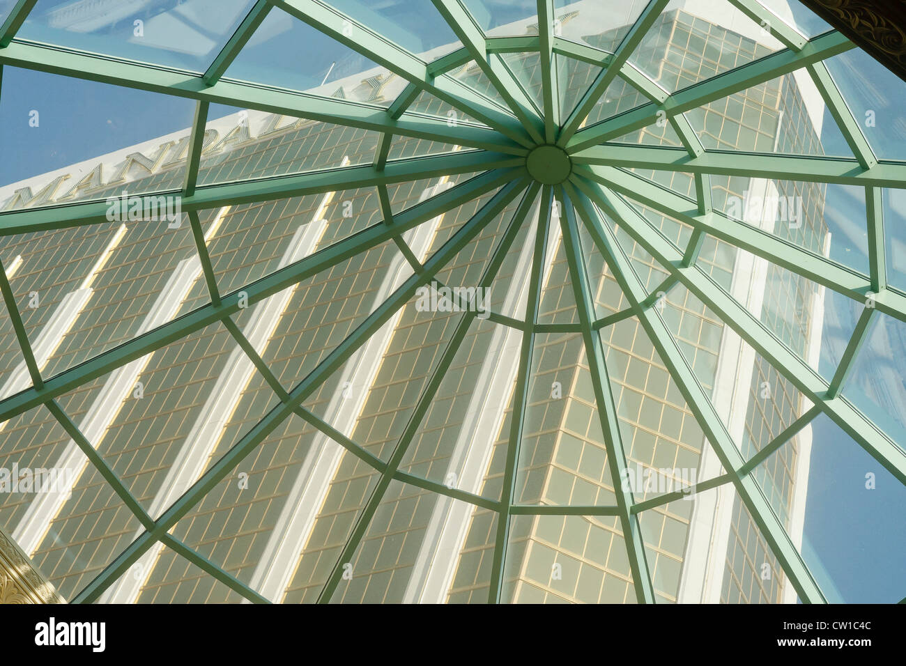 A decorative skylight looking into blue sky and buildings Stock Photo ...