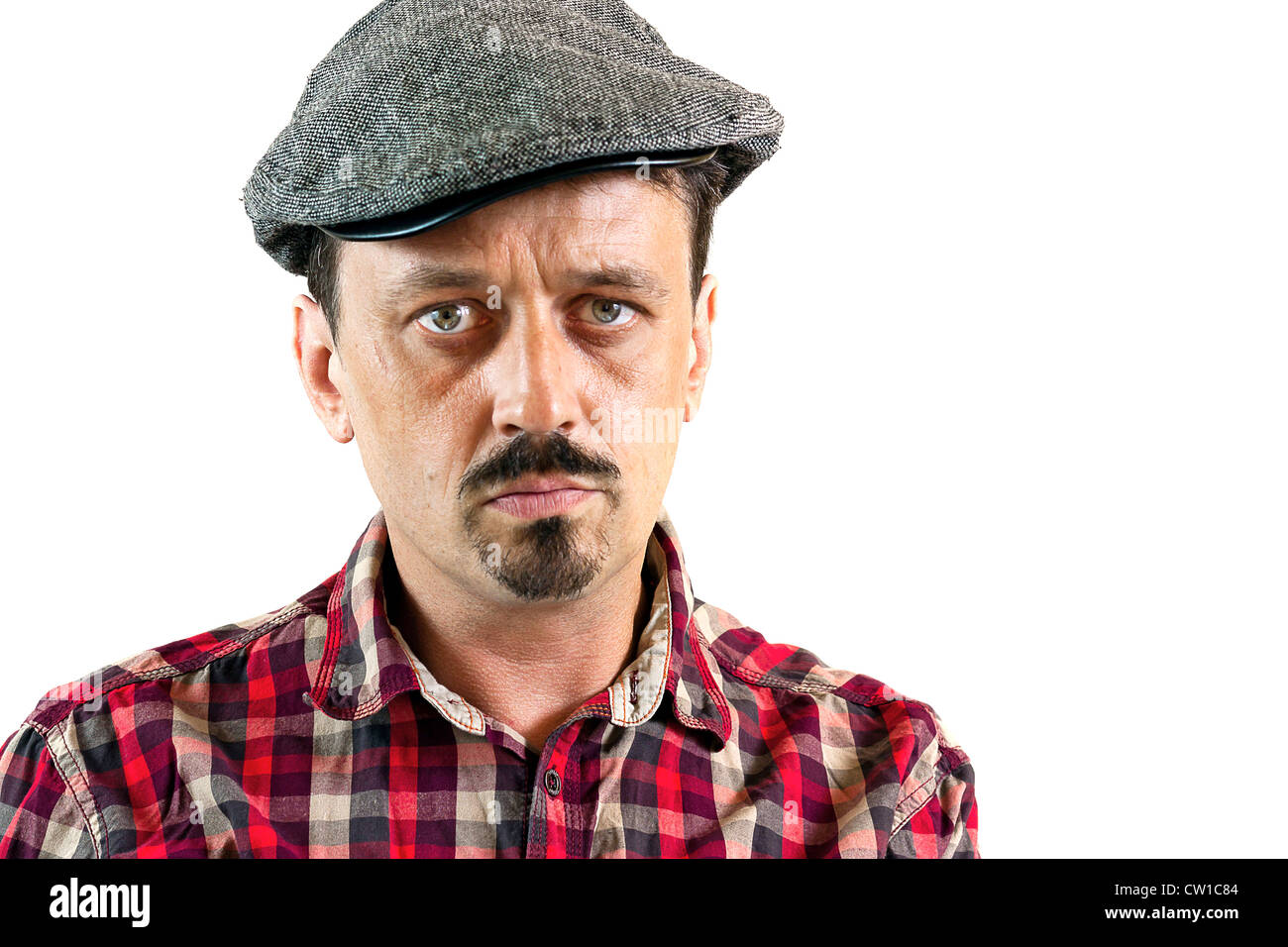 Closeup portrait of a young man man wearing a cap, isolated on white ...