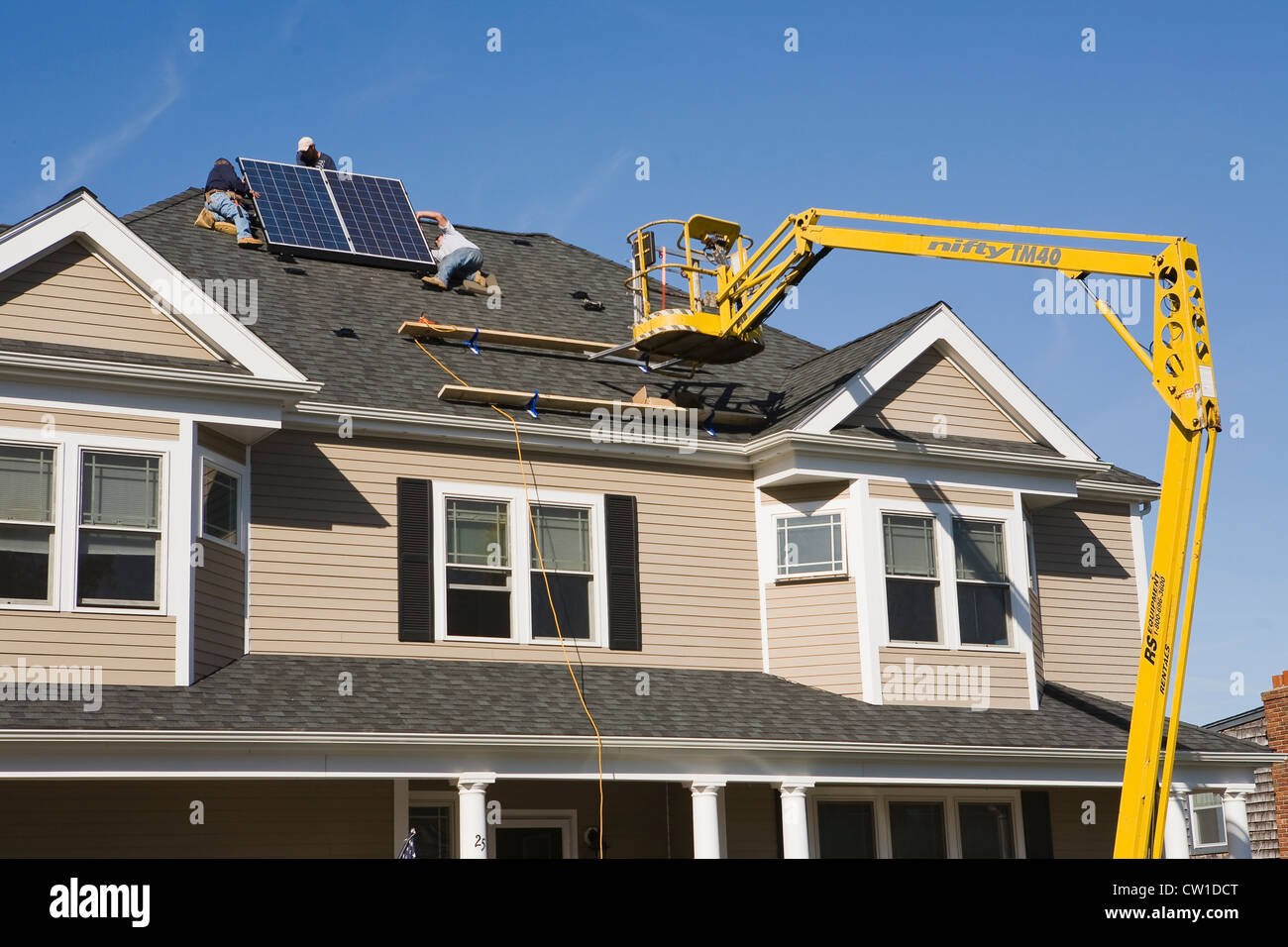 Installation of Solar Panels on Residential Home Stock Photo - Alamy