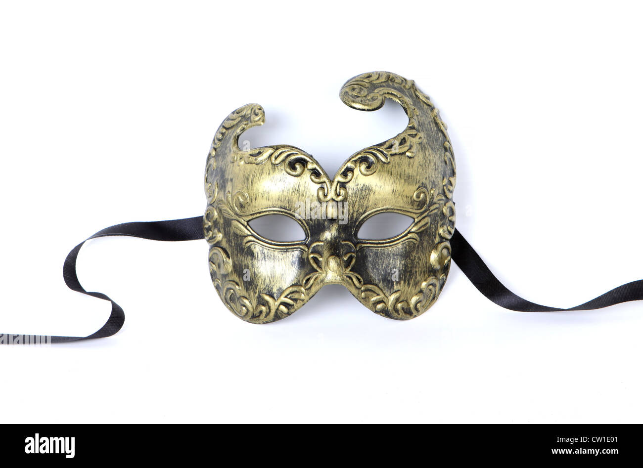 Gold filigree Venetian mask on white background with soft shadows Stock ...