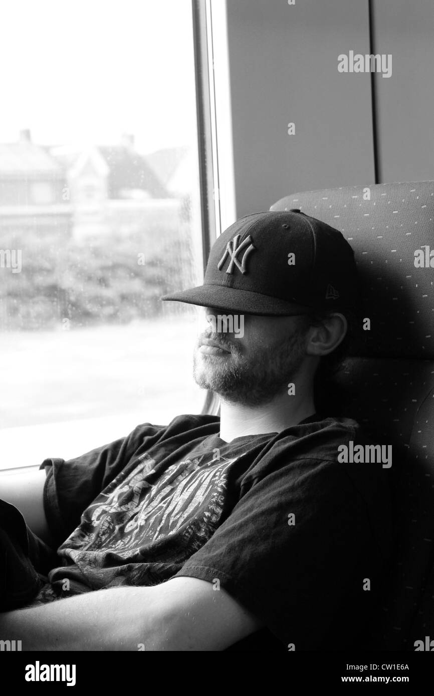 Sleeping in a Belgian train Stock Photo - Alamy