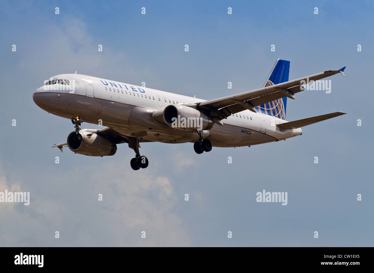 Airplane on a landing path - United Stock Photo - Alamy