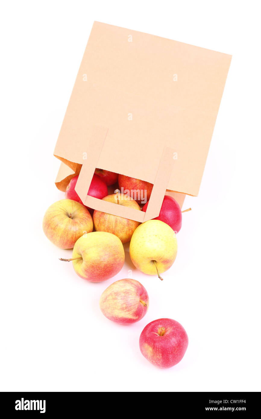 Shopping brown recycle gift bags and red apple isolated on white ...