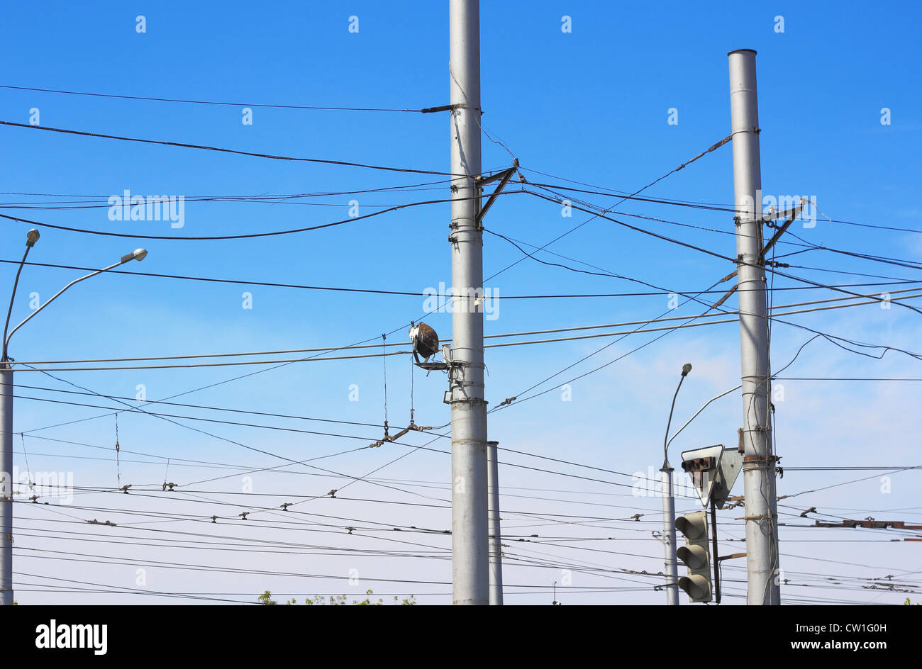 Railroad railway catenary lines against clear blue sky Stock Photo - Alamy