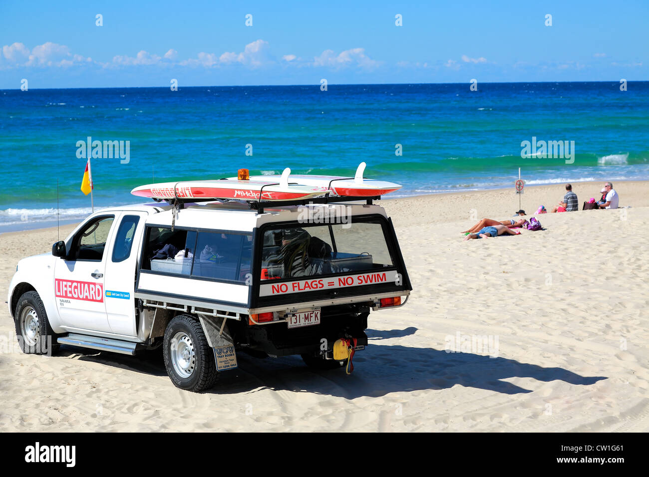 Lifeguard on beach patrol even in cold weather when the beach is ...