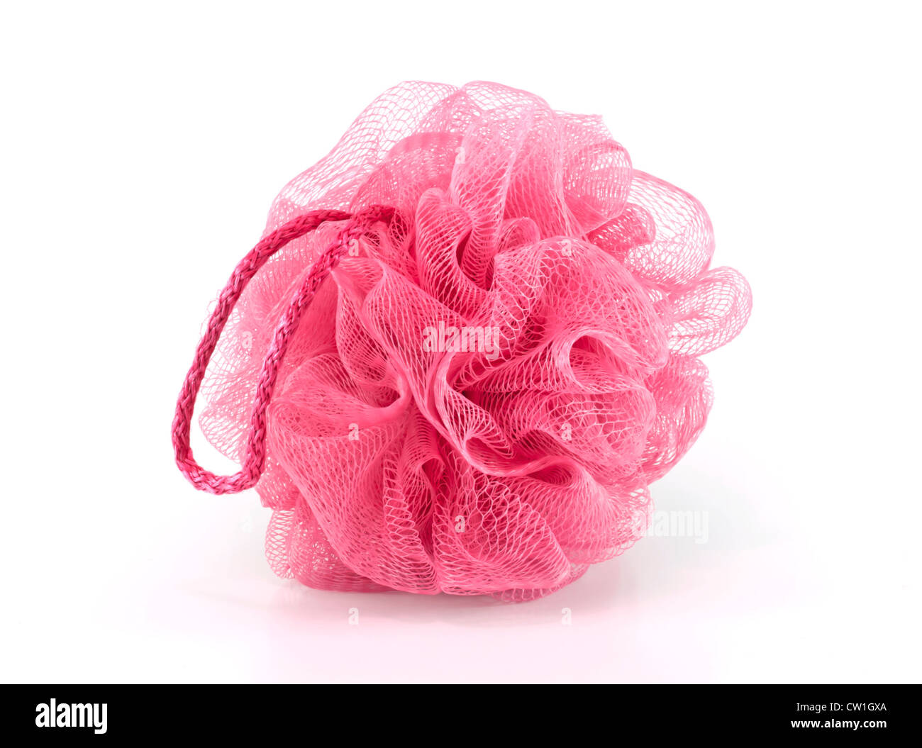 Soft pink bath puff or sponge isolated on white background with copy ...