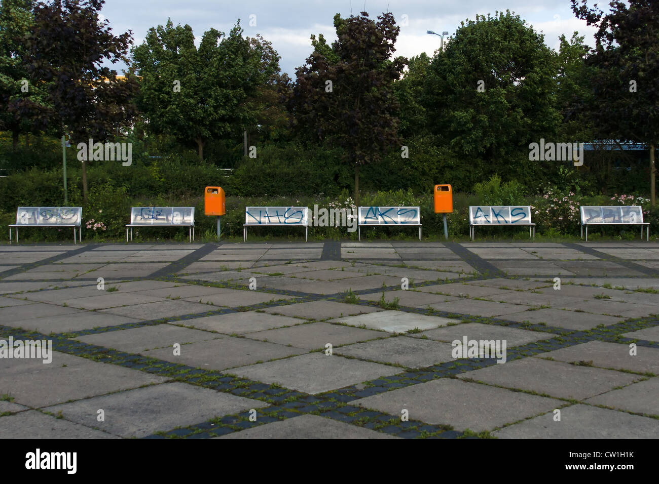 Empty square and free benches for rest Stock Photo - Alamy