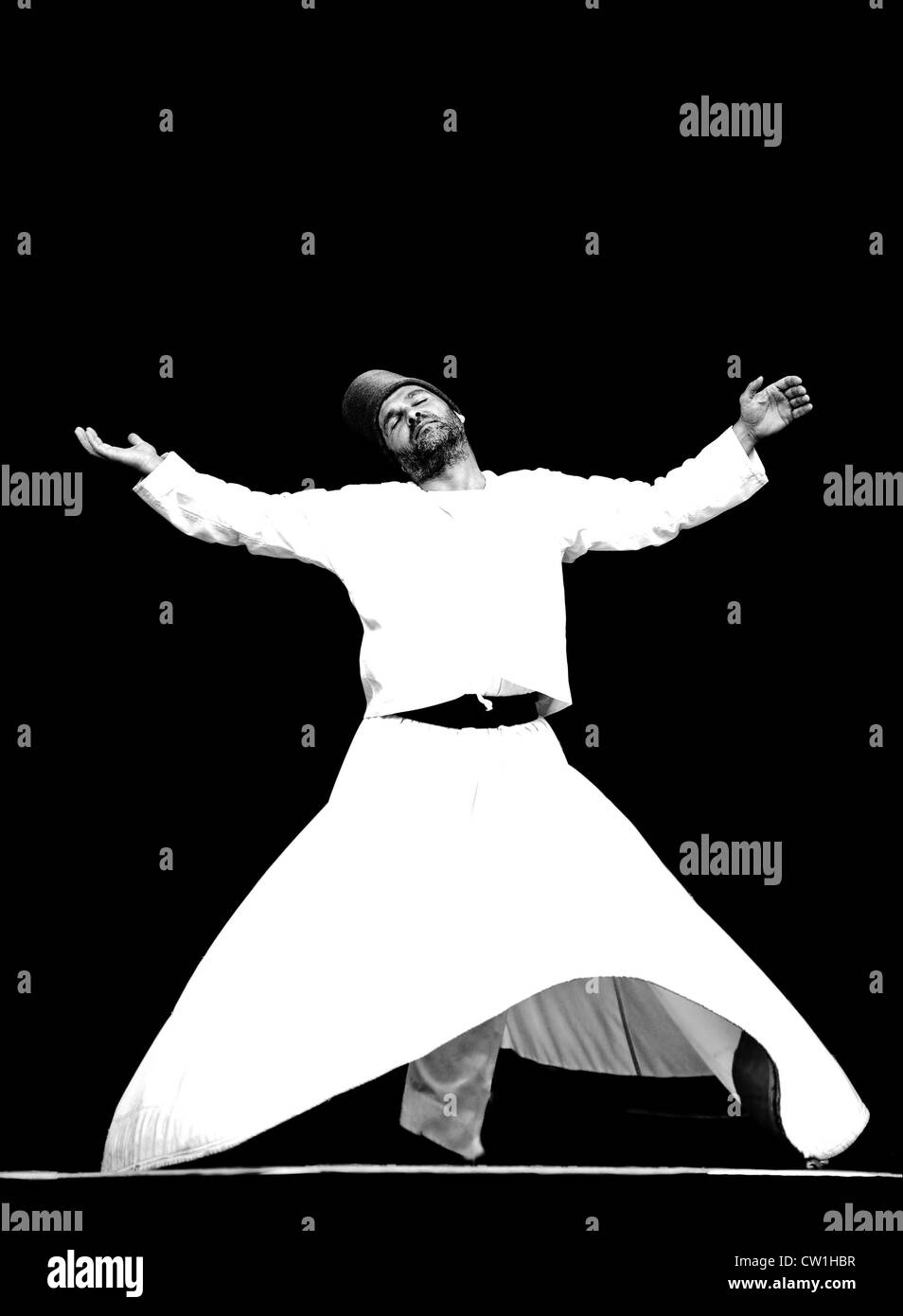 Whirling Dervish dancer on black and white Stock Photo - Alamy