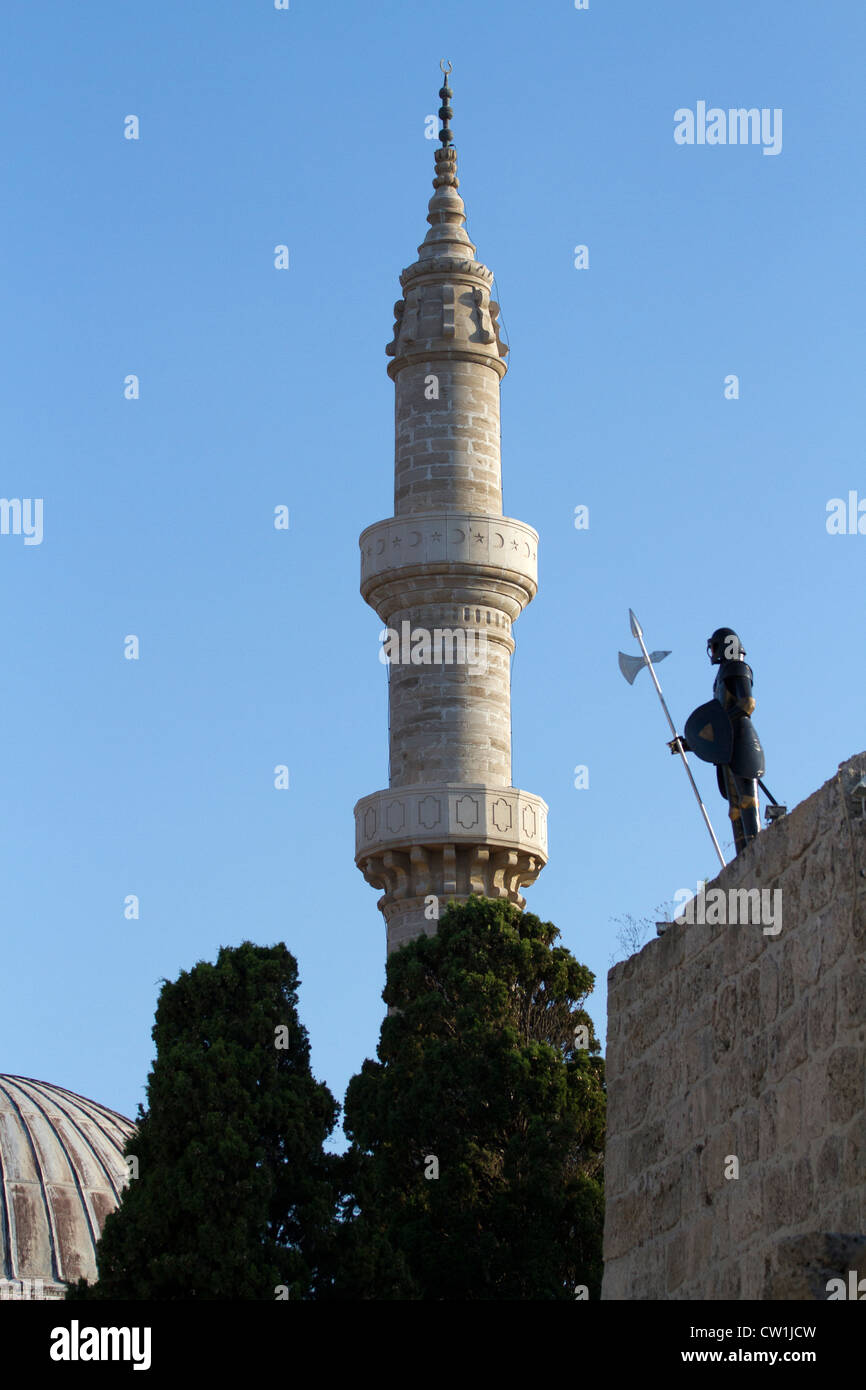 A view of old town Rhodes with a backdrop of Rhodes Turkish heritage ...