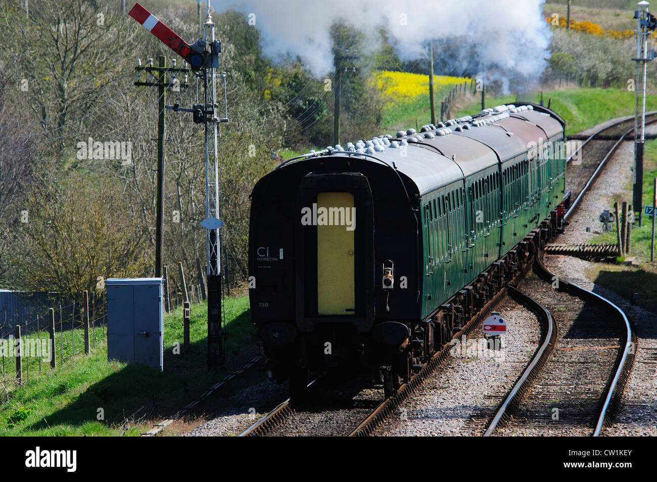 Steam train departing Corfe Castle station, Dorset, UK Stock Photo - Alamy