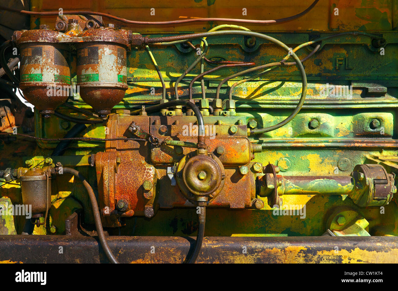 Rusty and disused tractor engine Stock Photo - Alamy