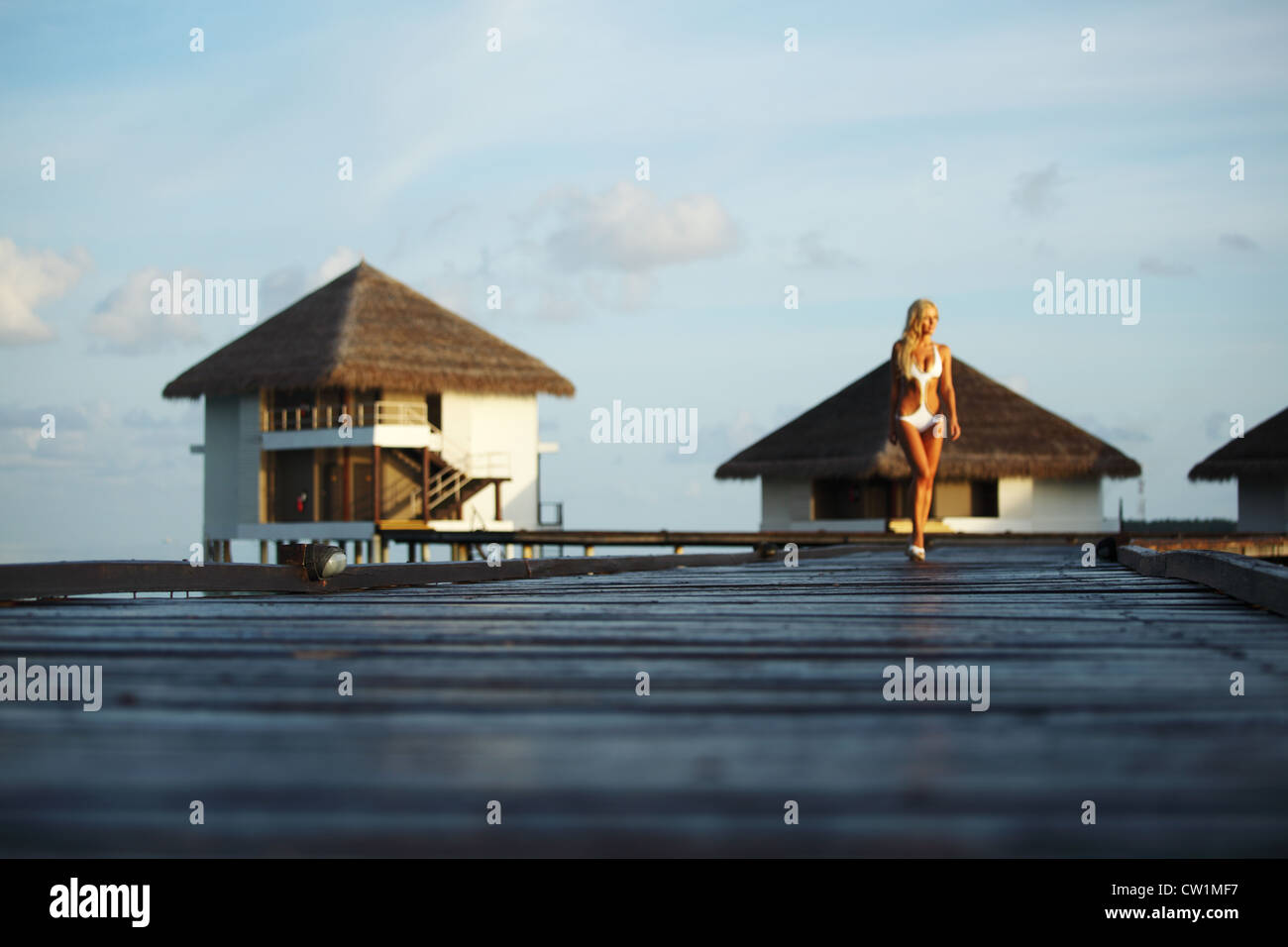 Woman young bikini bridge sea hi-res stock photography and images - Alamy