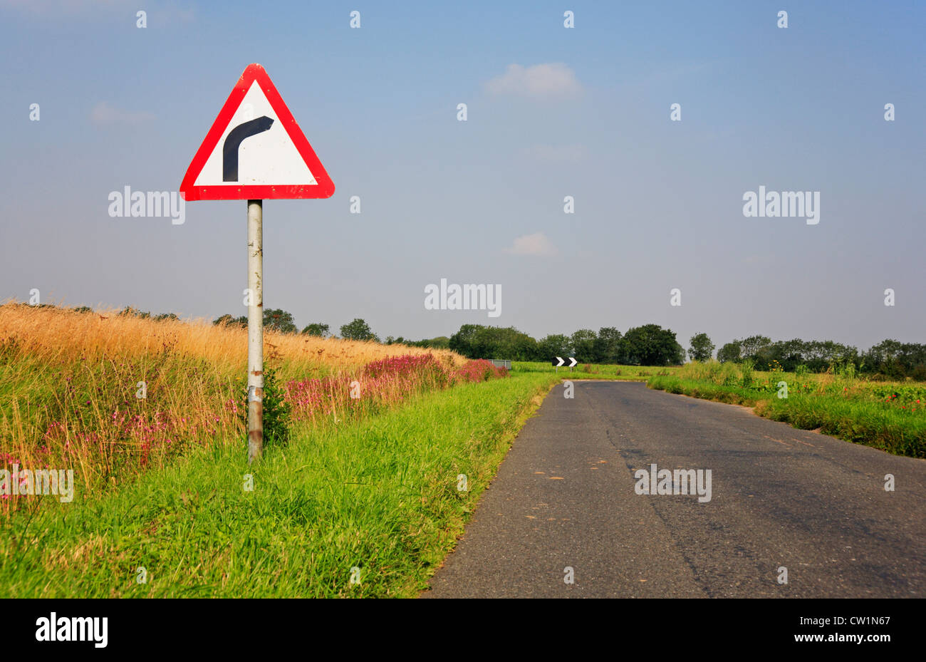 A right hand bend sign on a country road in South Norfolk, England ...