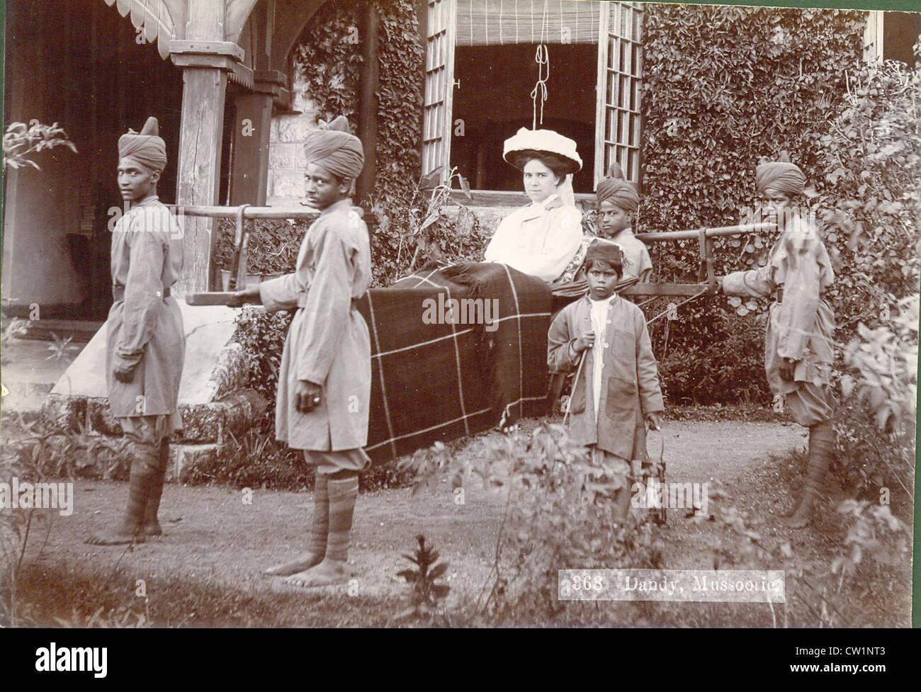 Photograph of memsahib in dandy with bearers circa 1895 Stock Photo - Alamy