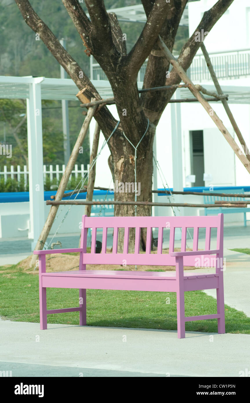 pink street chair in the park Stock Photo - Alamy