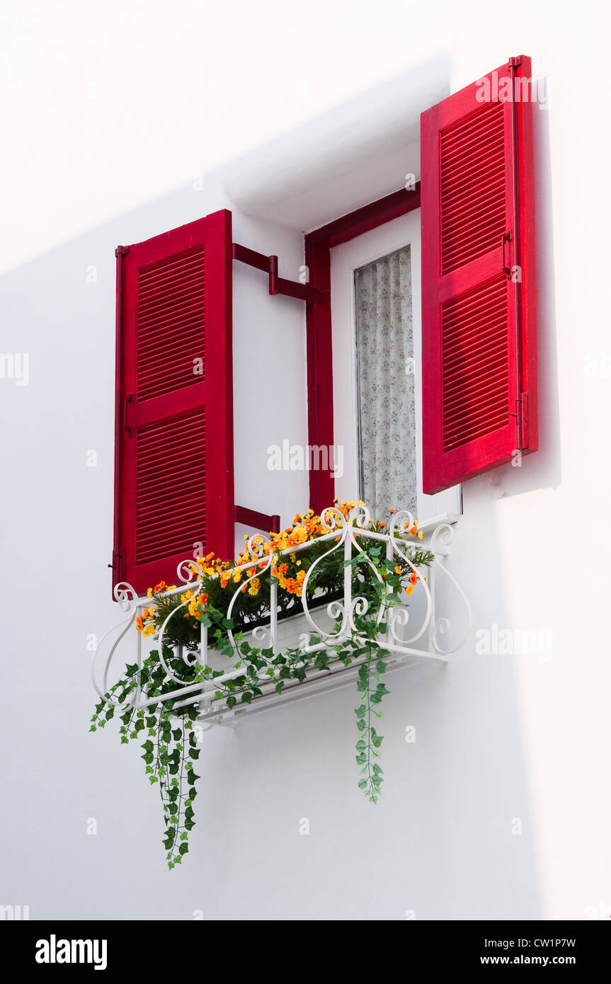 red vintage windows in Greek Style Stock Photo - Alamy