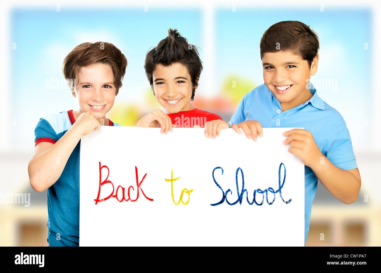 Three classmate boys playing in classroom, best friends holding white ...