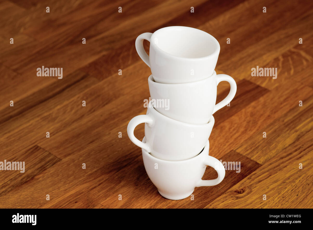 Stack of white china coffee cups Stock Photo - Alamy