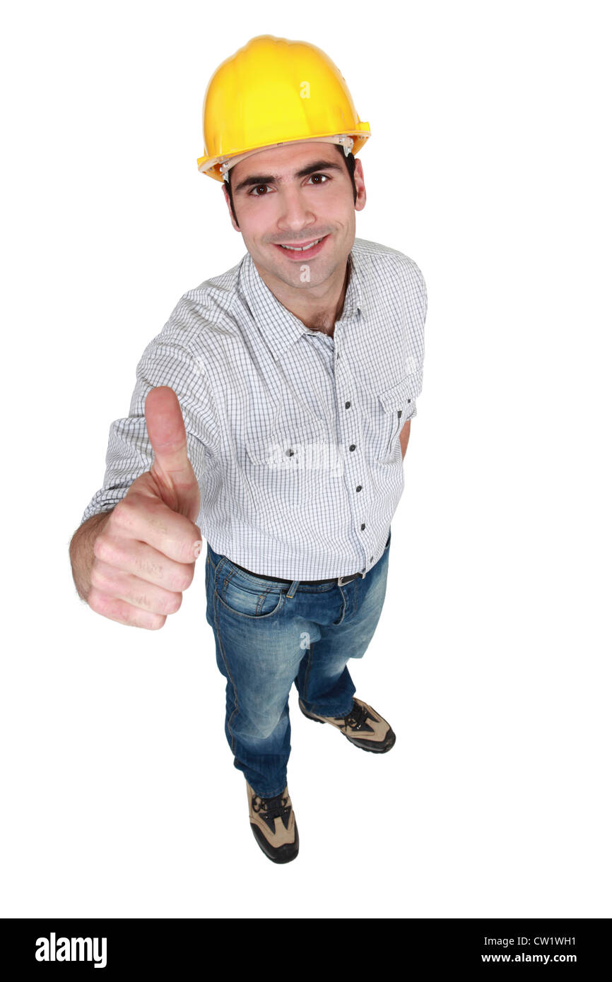 Construction worker giving the thumb's up Stock Photo - Alamy