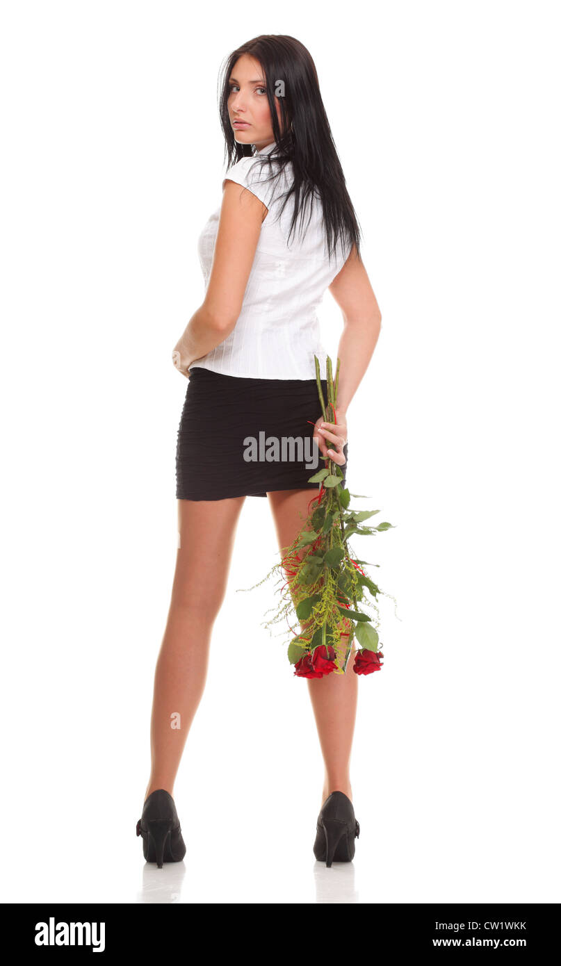 Beautiful young girl posing with a red rose woman isolated on white ...