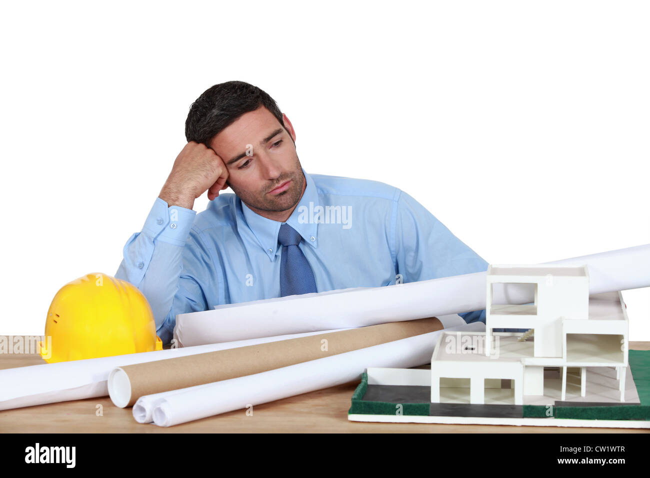 A bored architect at his desk Stock Photo - Alamy