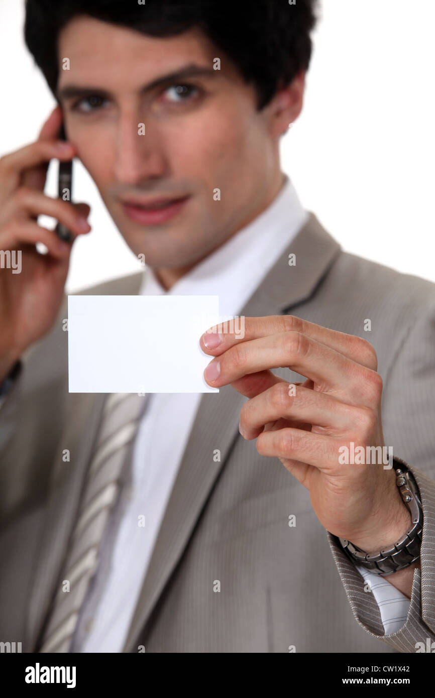 handsome businessman showing business card Stock Photo - Alamy