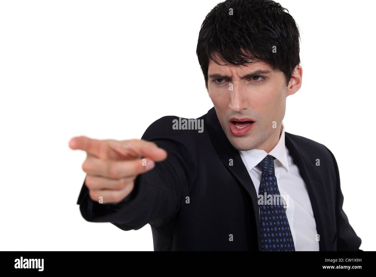 Aggressive businessman pointing Stock Photo - Alamy
