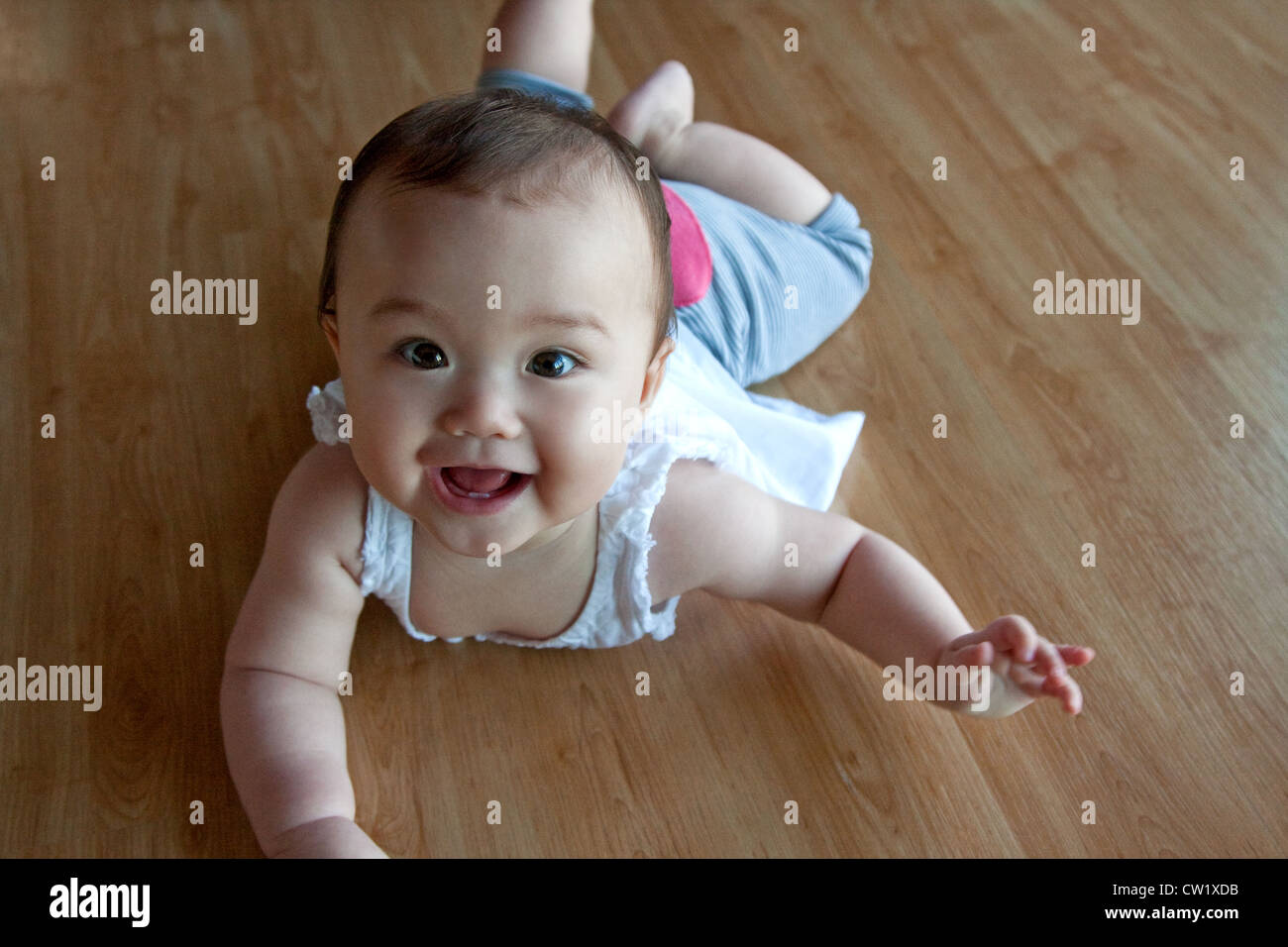 Baby girl crawling asian hi-res stock photography and images - Alamy