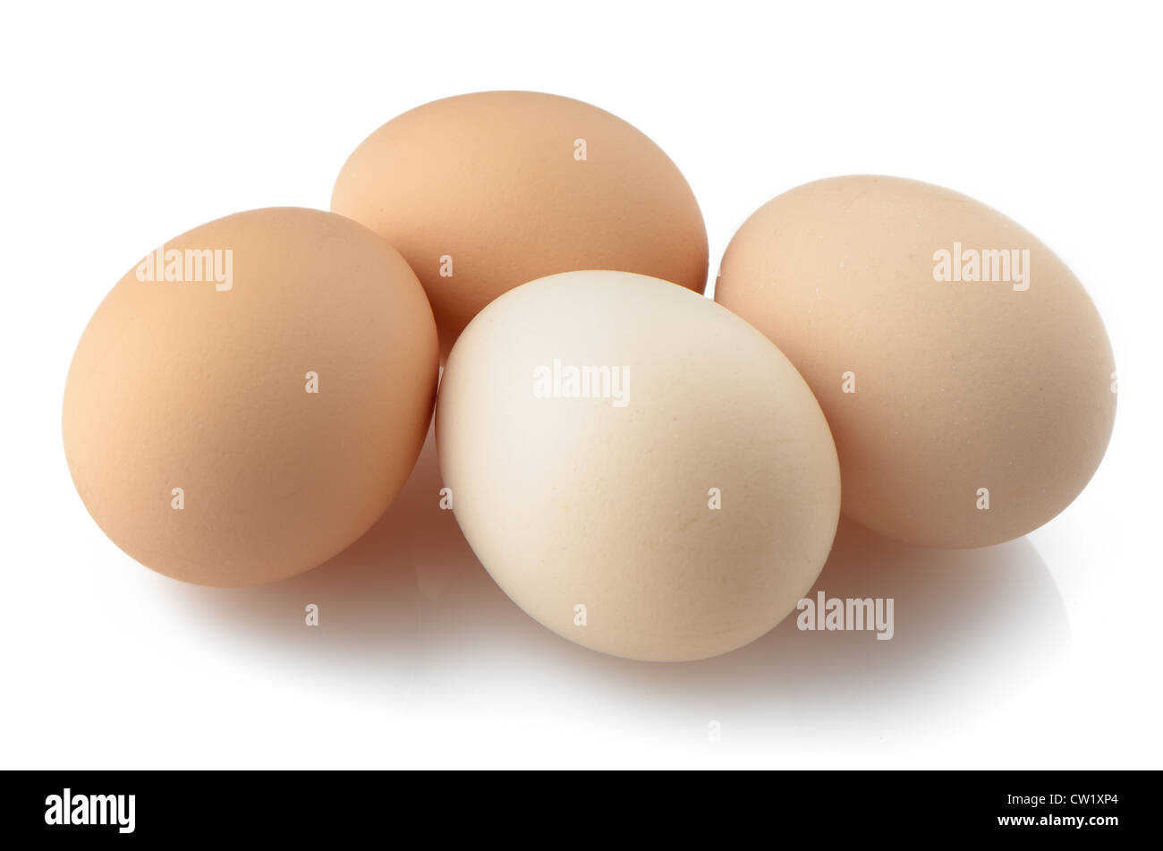 Four eggs isolated on white background Stock Photo - Alamy