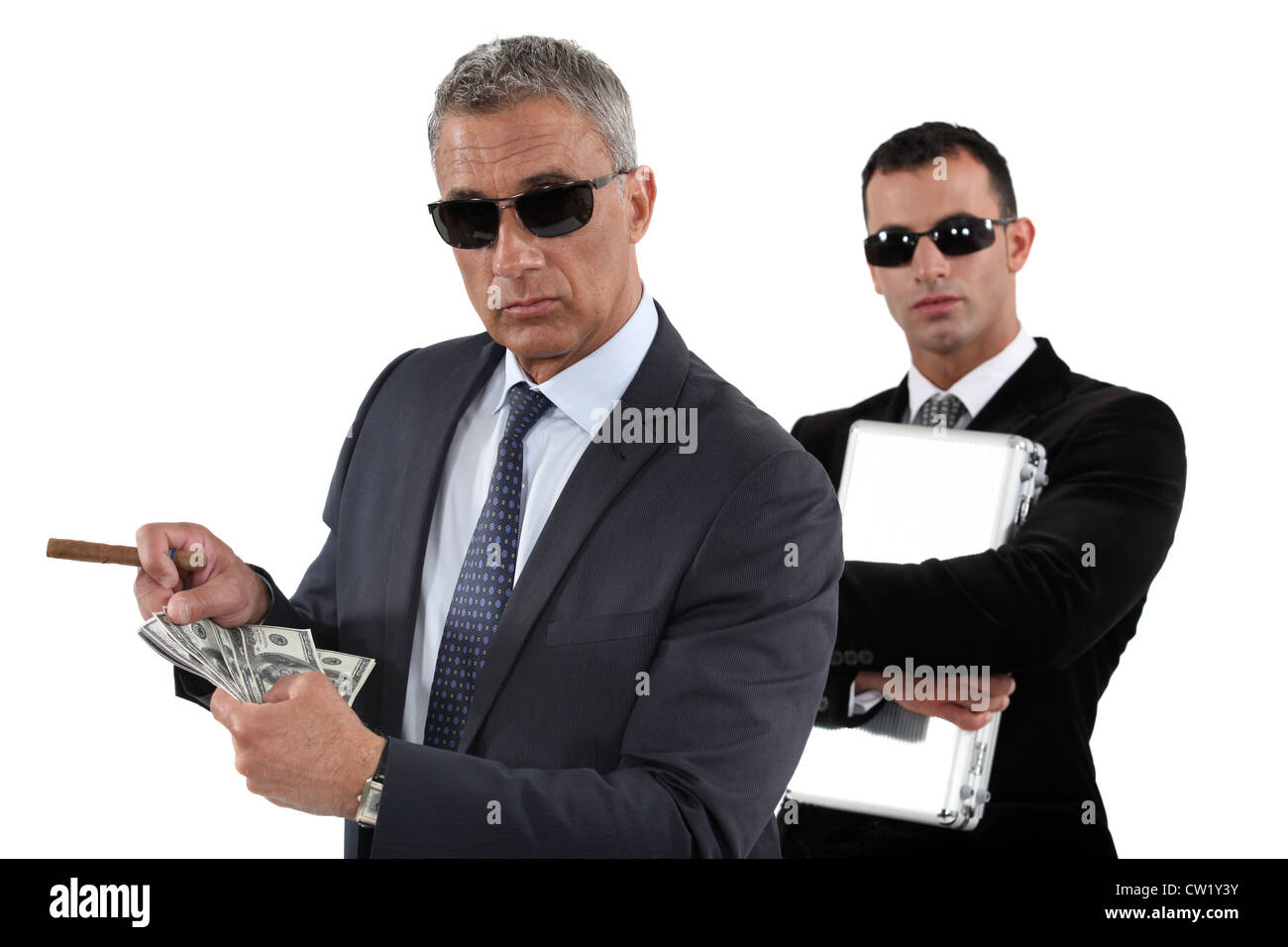 Briefcase money two people hi-res stock photography and images - Alamy