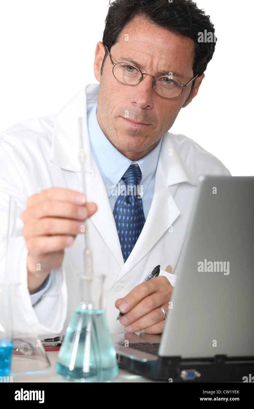 Lab technician analyzing test results Stock Photo - Alamy