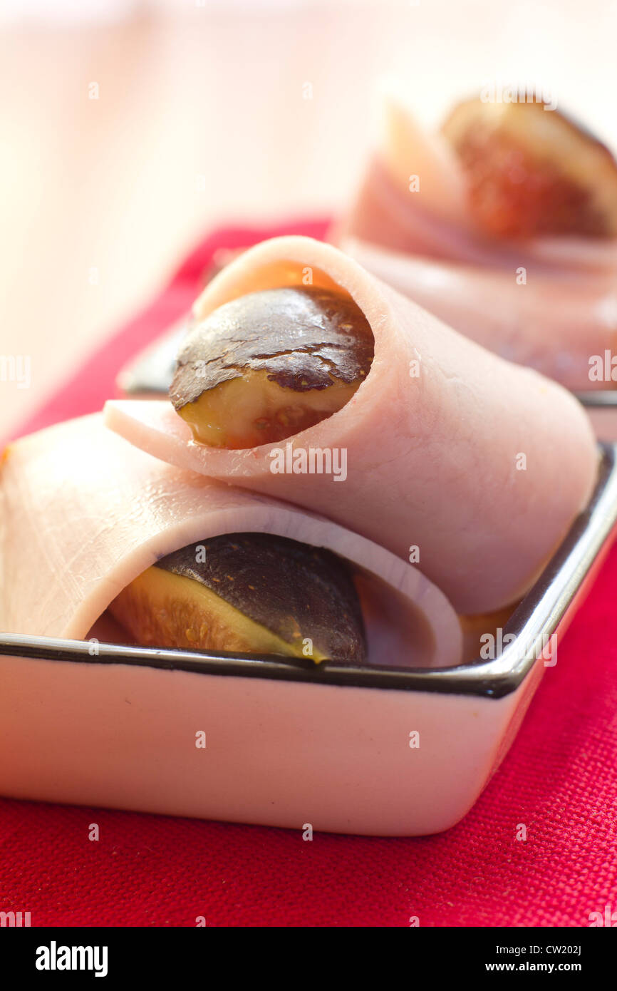 Figs wrapped in ham Stock Photo - Alamy