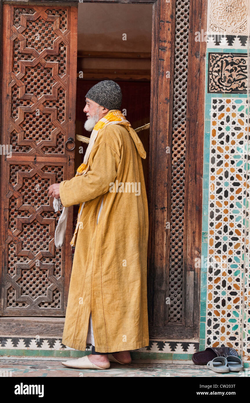 pilgrim at the Medersa Bou Inania in ancient Fes, Morocco Stock Photo ...