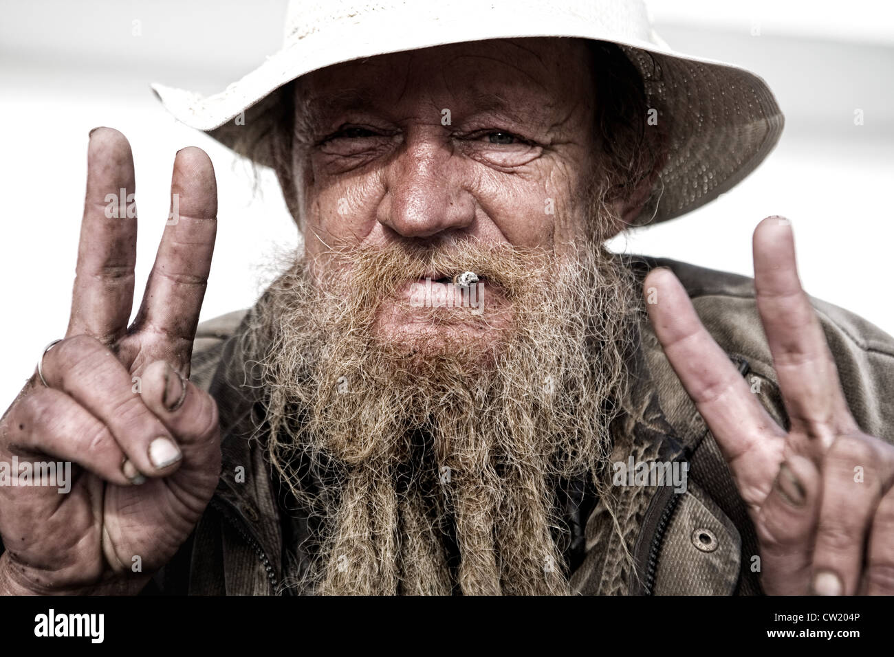 Smiling Homeless Man With Sign