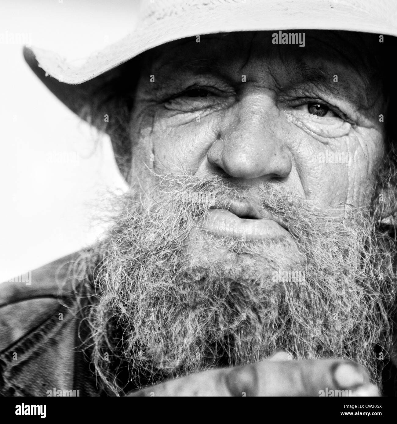Homeless man smoking a cigarette - Fuerteventura Stock Photo - Alamy