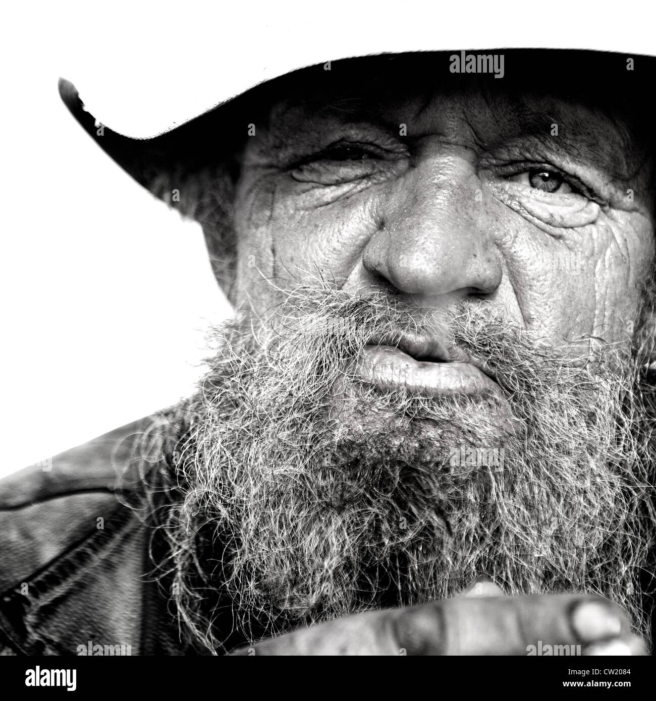 Old homeless man smoking a cigarette Stock Photo - Alamy