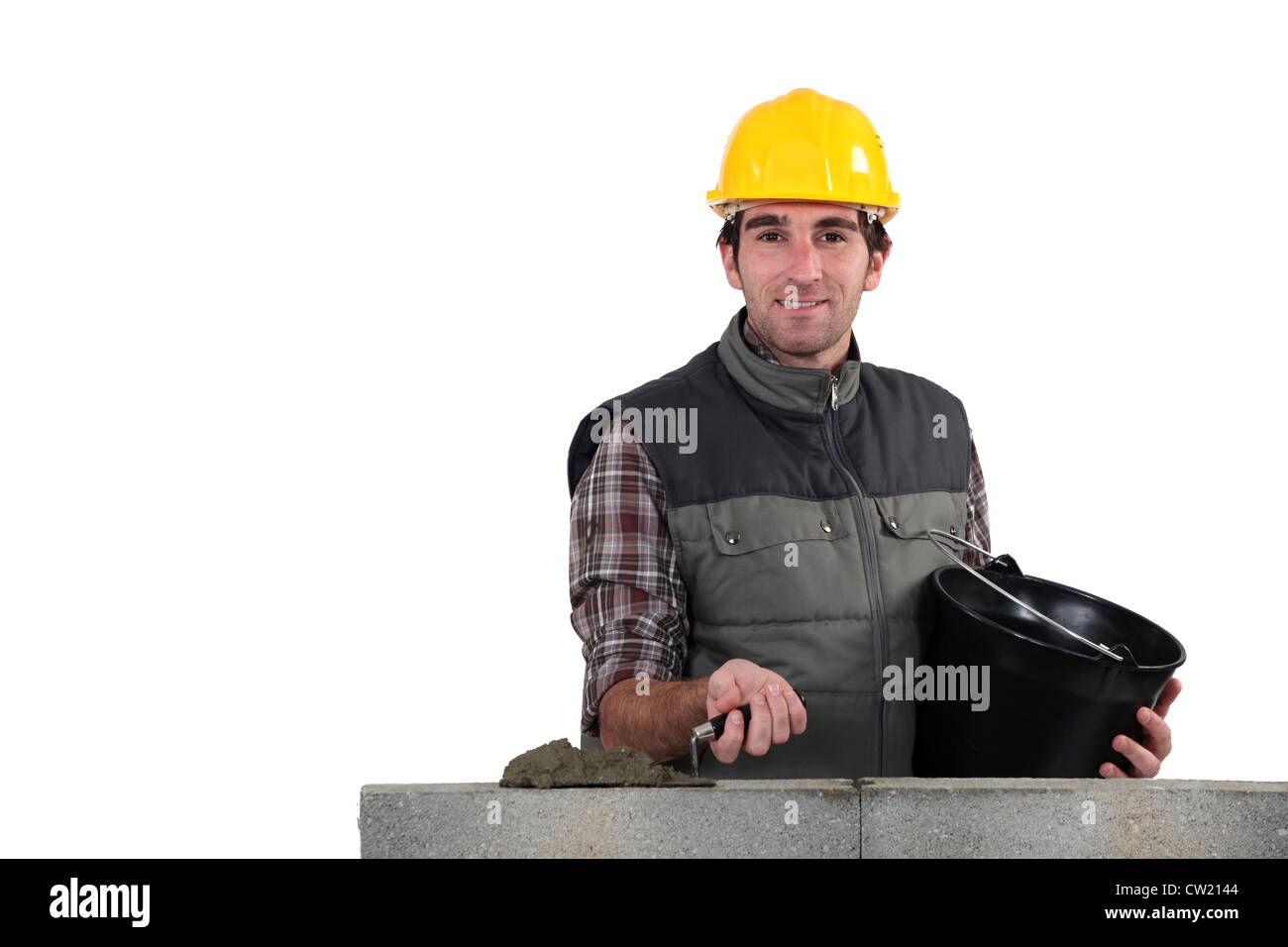 mason building wall Stock Photo - Alamy