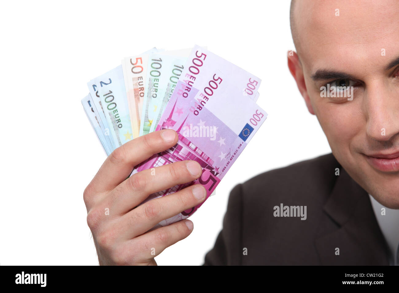 Man holding up banknotes Stock Photo - Alamy