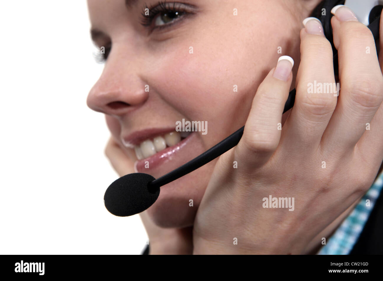 Brunette wearing telephone head-set Stock Photo - Alamy