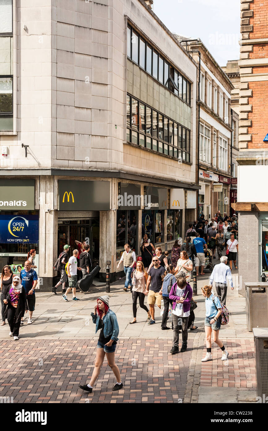 Shoppers pass by a McDonalds restaurant on St Peter's Gate, Nottingham ...