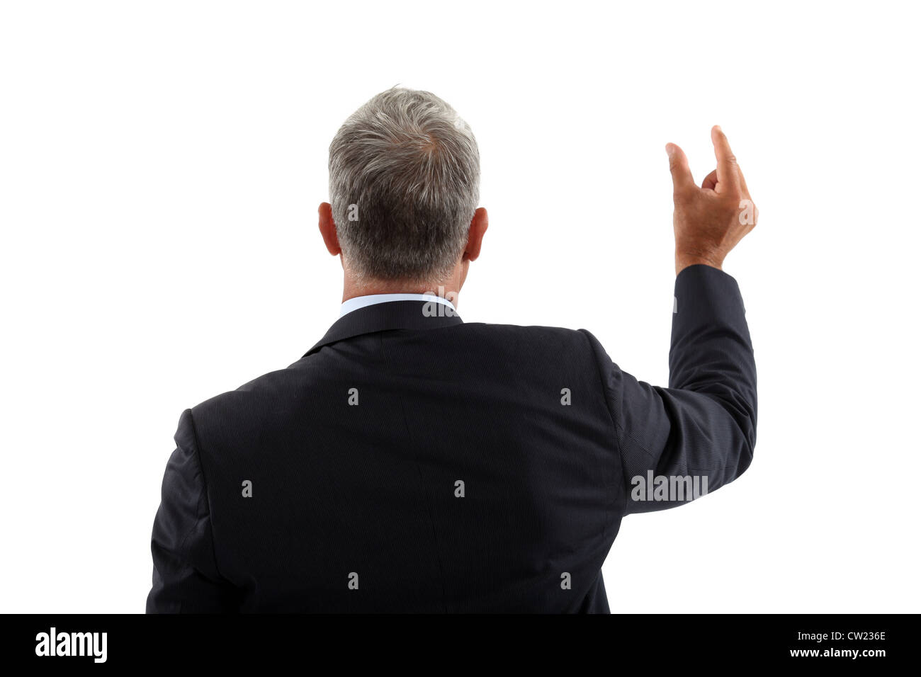 Businessman holding an invisible object Stock Photo - Alamy