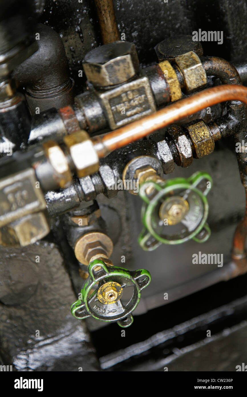 Control valves and copper pipework on steam locomotive Stock Photo - Alamy