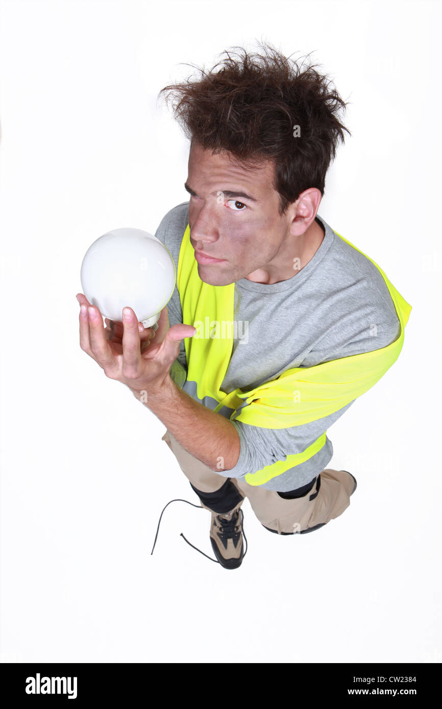 Man getting electric shock Cut Out Stock Images & Pictures - Alamy