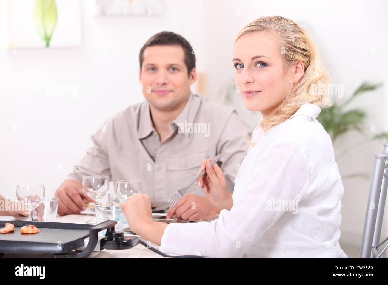 Friends having a nice dinner party Stock Photo - Alamy